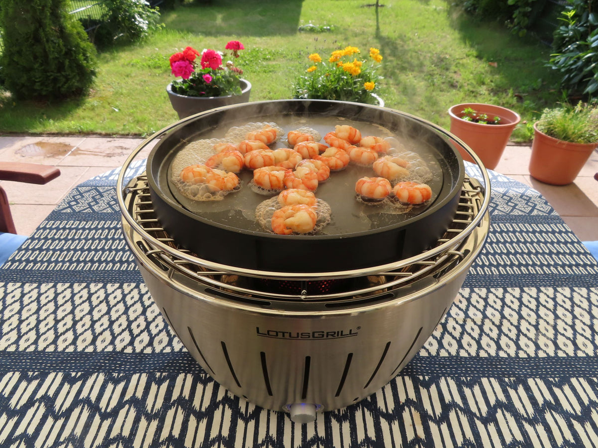 The smokeless Lotus BBQ Grill and the compatible Teppenyaki plate ...